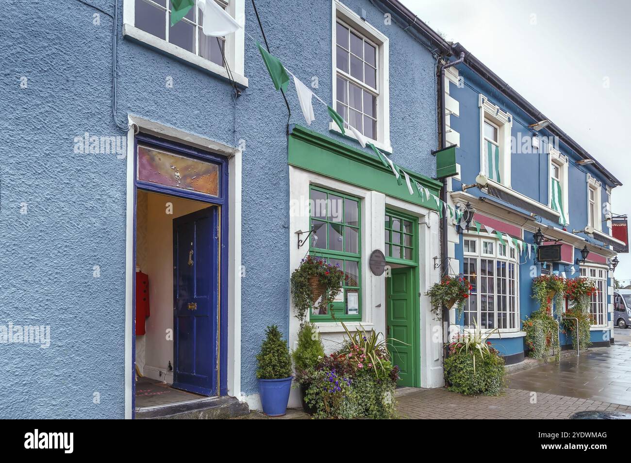 Street with bright houses in Adare, County Limerick, Ireland, Europe ...
