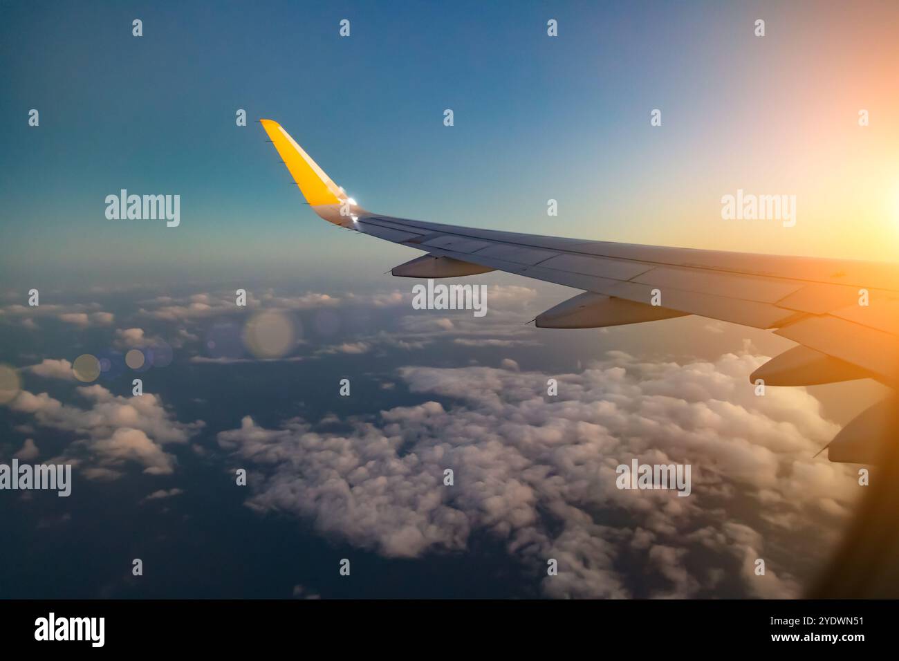 Flight above sunrise clouds hi-res stock photography and images - Alamy