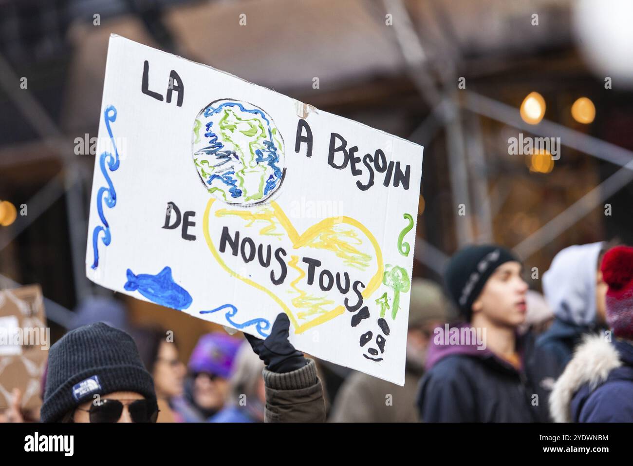 French sign seen in an ecological protest saying the earth needs us all ...