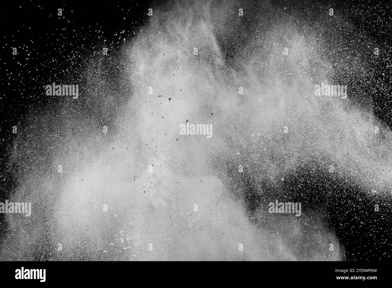 Bizarre forms of white powder explosion cloud against black background ...