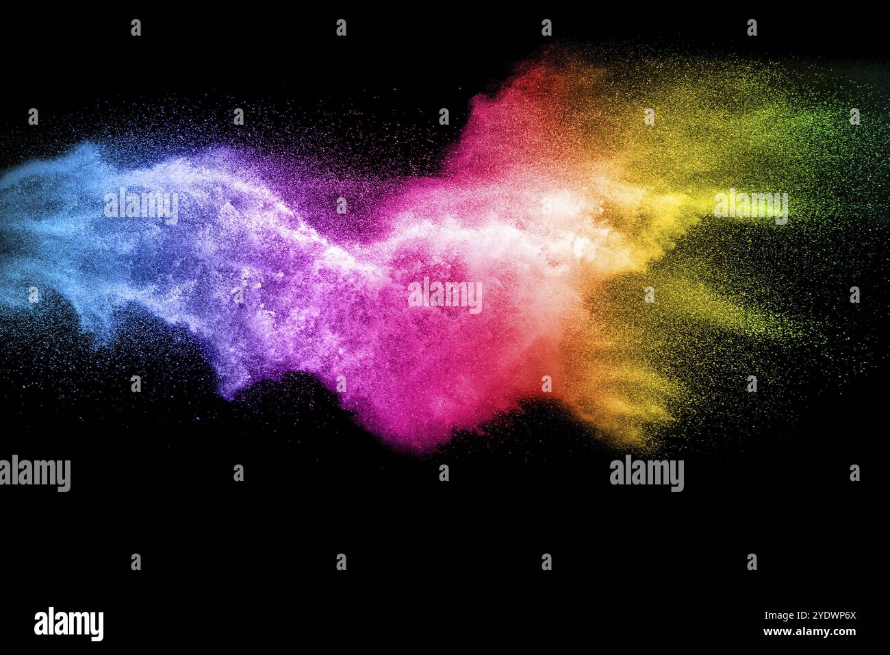 Multicolored powder explosion on white background. Color dust particle ...