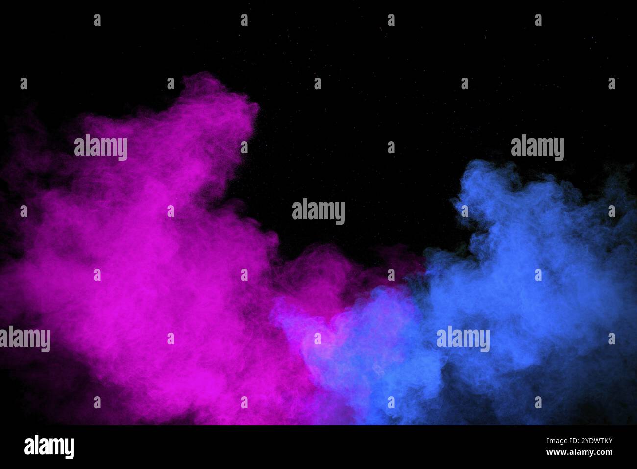 Blue pink color powder explosion on black background Stock Photo - Alamy