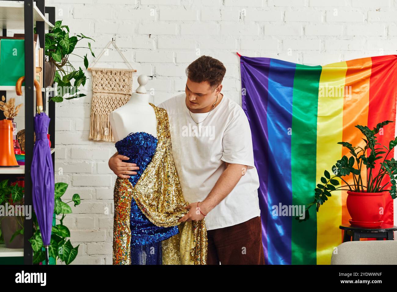 A person expresses creativity by draping sequined fabric over a ...