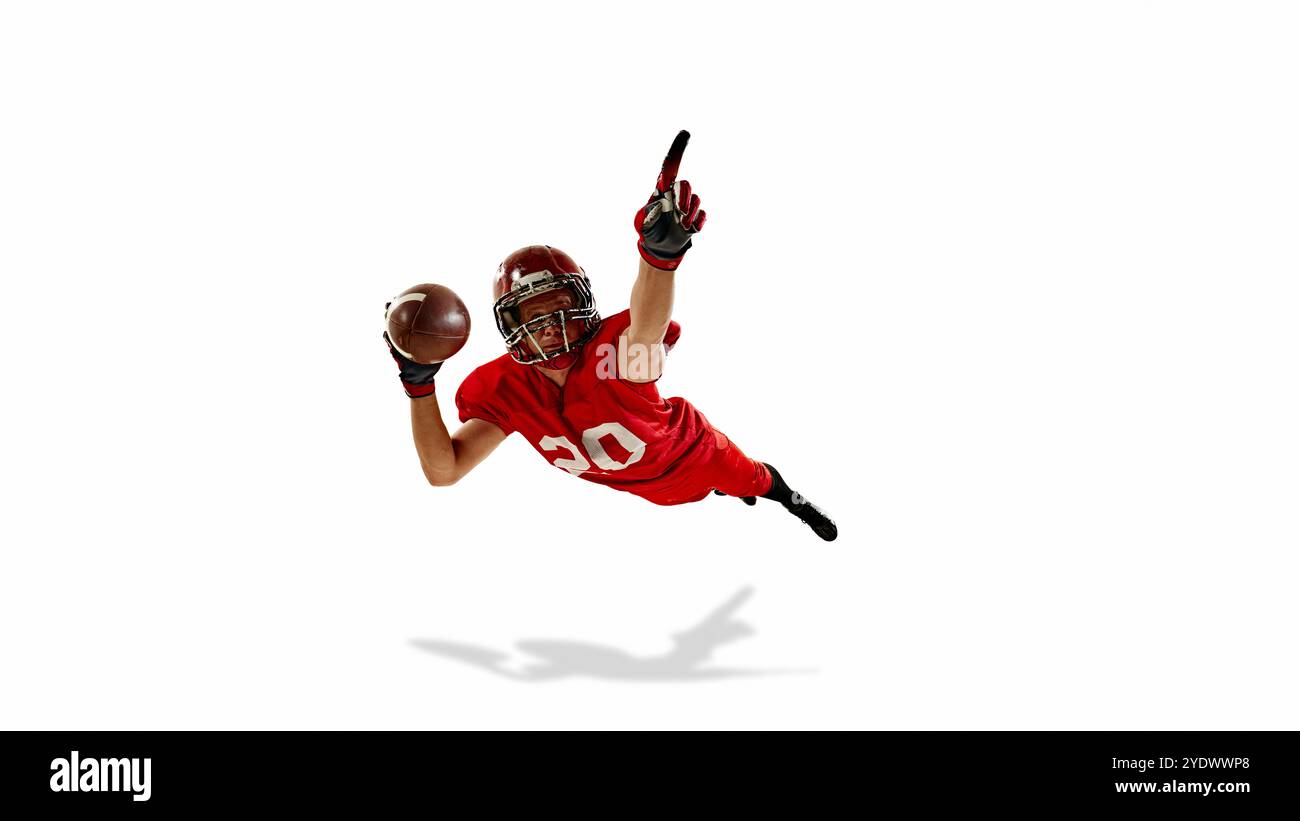 Dynamic image of man, American football player in red uniform, catching ...