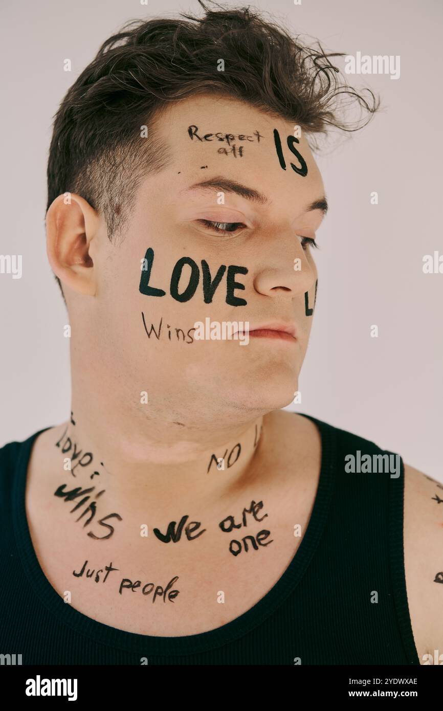 A queer person showcases powerful messages of love and unity through ...