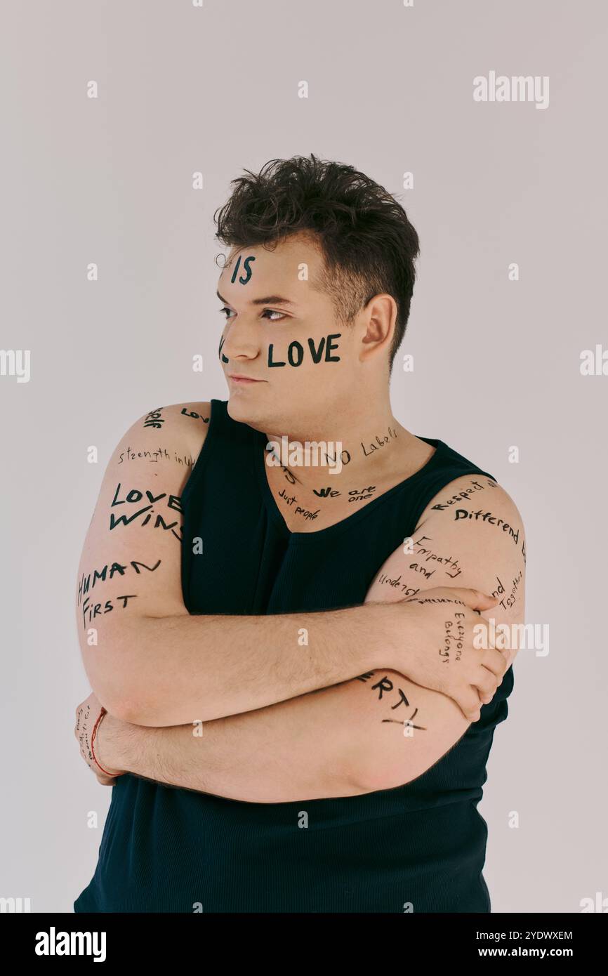 A queer person stands confidently with meaningful messages written on ...