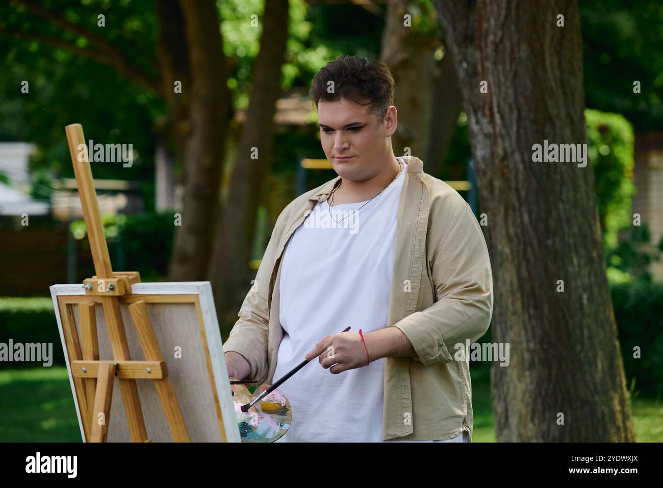 A unique individual passionately expresses creativity through art in ...