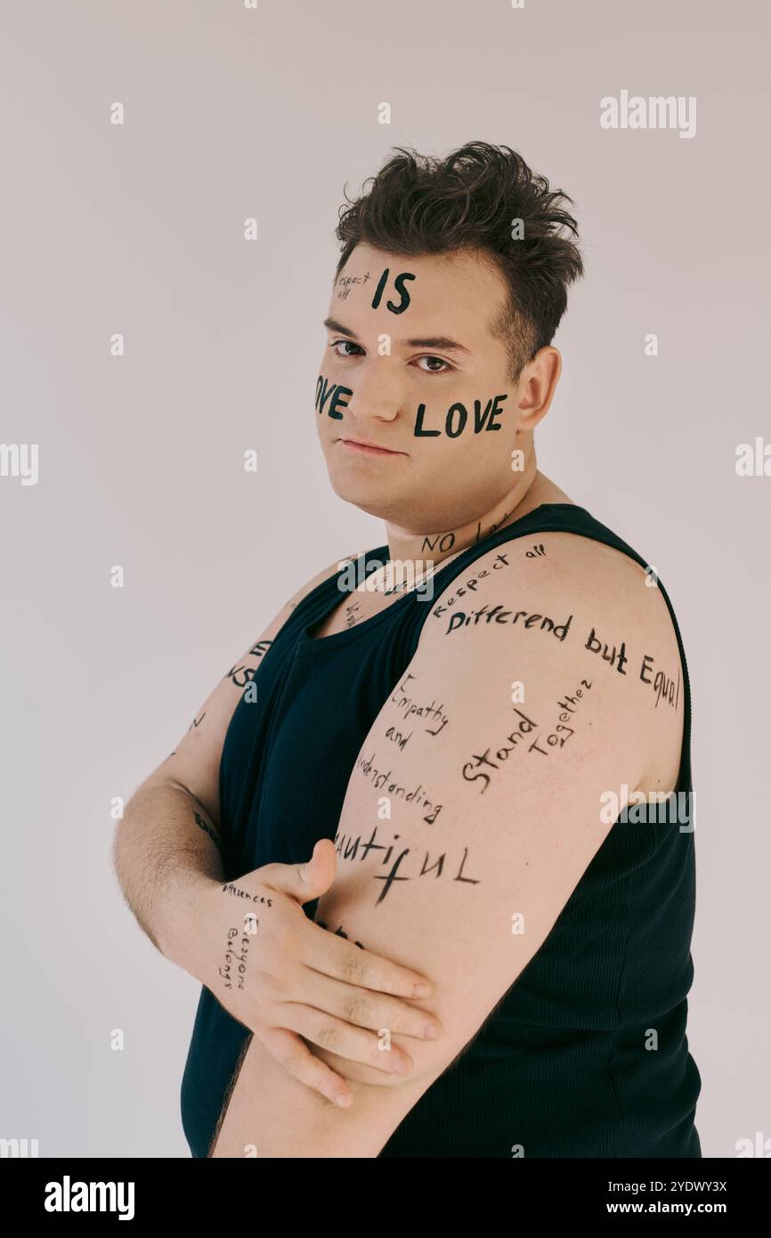 The queer person proudly reveals their body decorated with affirmations ...