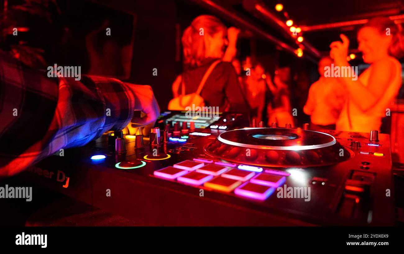 DJ mixing table at nightclub Stock Photo - Alamy