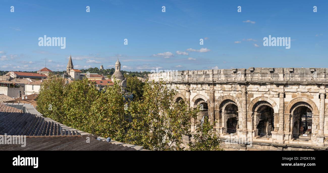 Scenic cityscape panorama of Nîmes city with landmark roman arena and ...