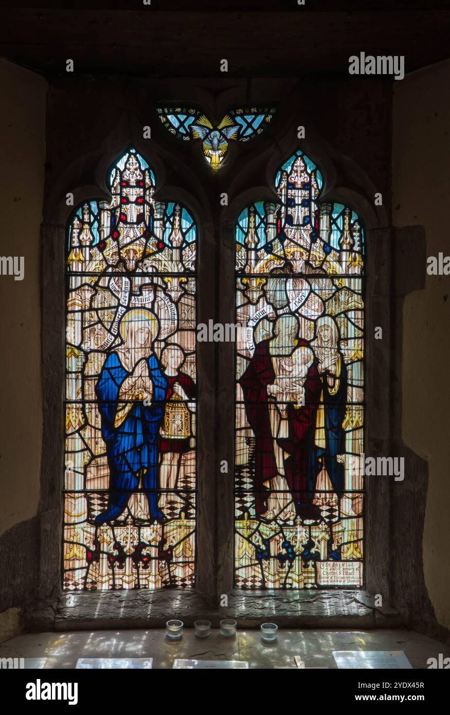 Stained glass depicting the new born and the child Jesus, St Mary ...