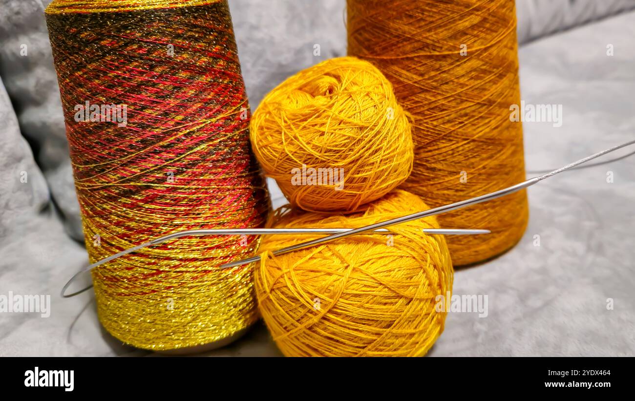 Orange threads handicrafts selecting color hi-res stock photography and ...