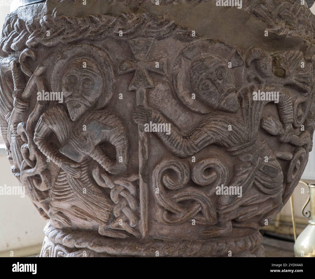 12th century Norman Font depicting Christ with his Staff to his right ...