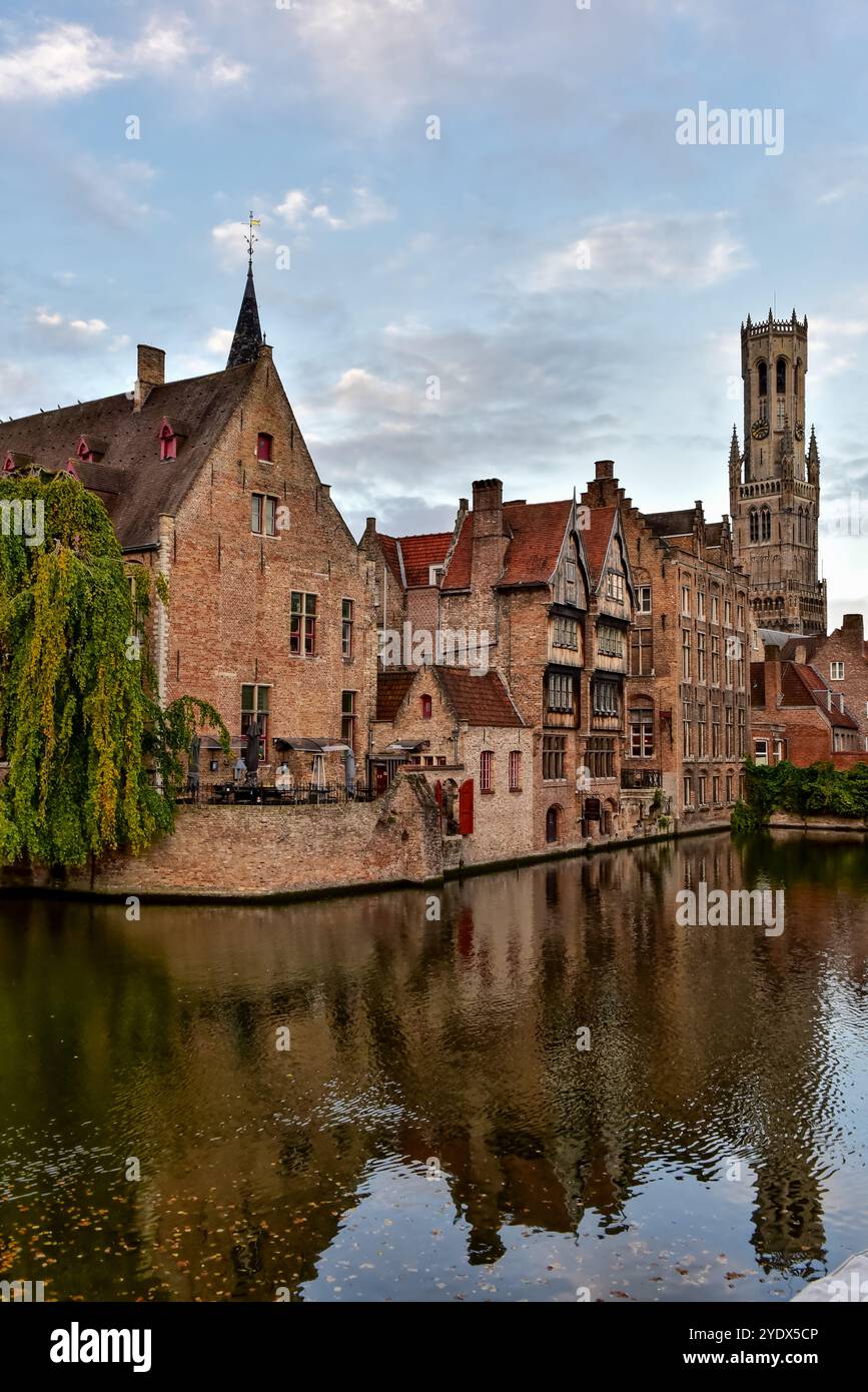 Belfry of Bruges, medieval buildings and their reflection on the Dijver ...