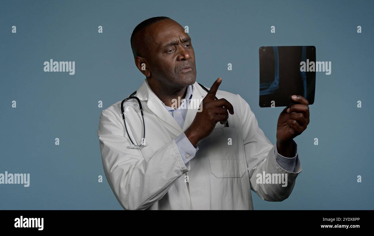 Pensive thoughtful african american man doctor ethnic male radiologist ...
