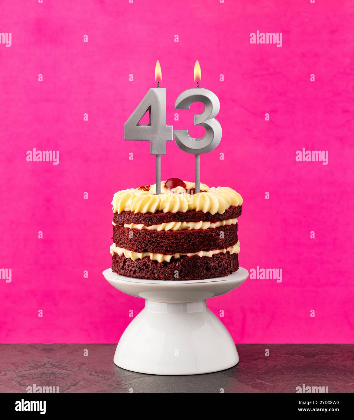 Birthday cake with number 43 candle - Red velvet on a fuchsia ...