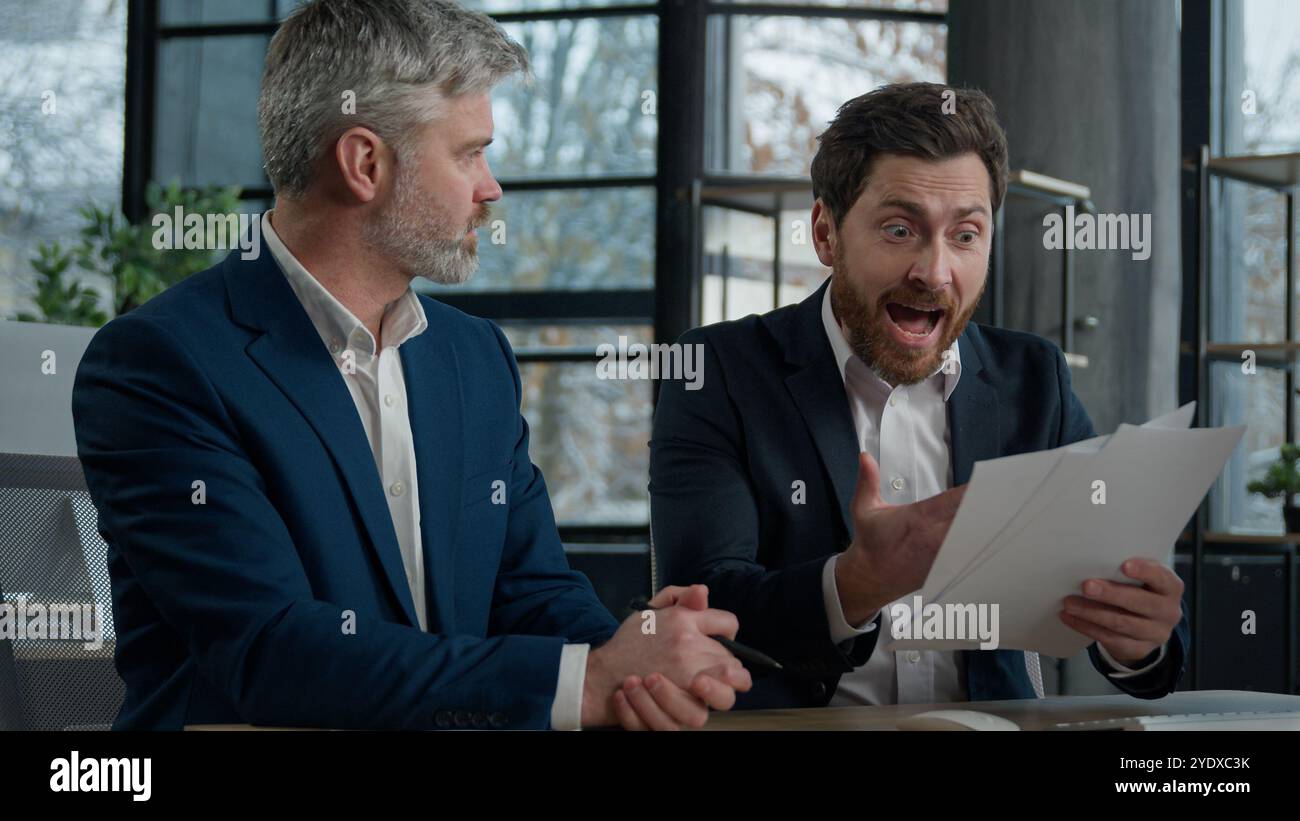 Nervous angry man boss argue scolds employee because mistake in ...