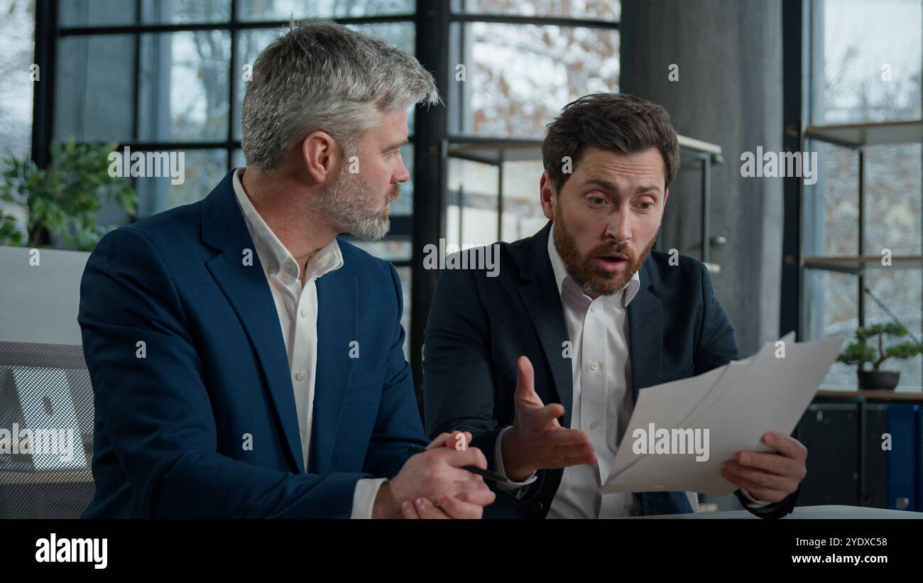 Nervous angry man boss argue scolds employee because mistake in ...