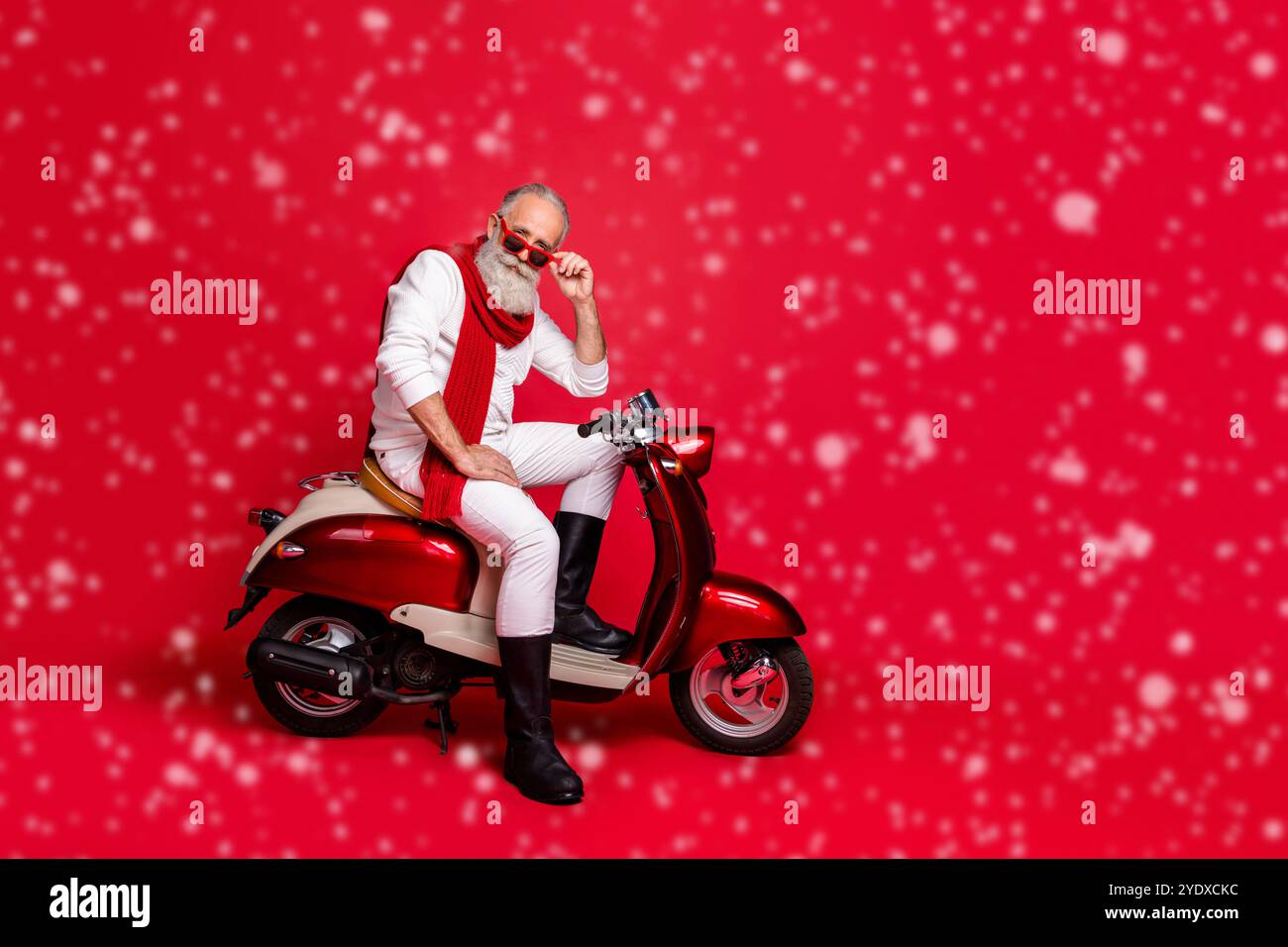 Flirty grandfather santa man sitting on retro moped wear jumper and ...