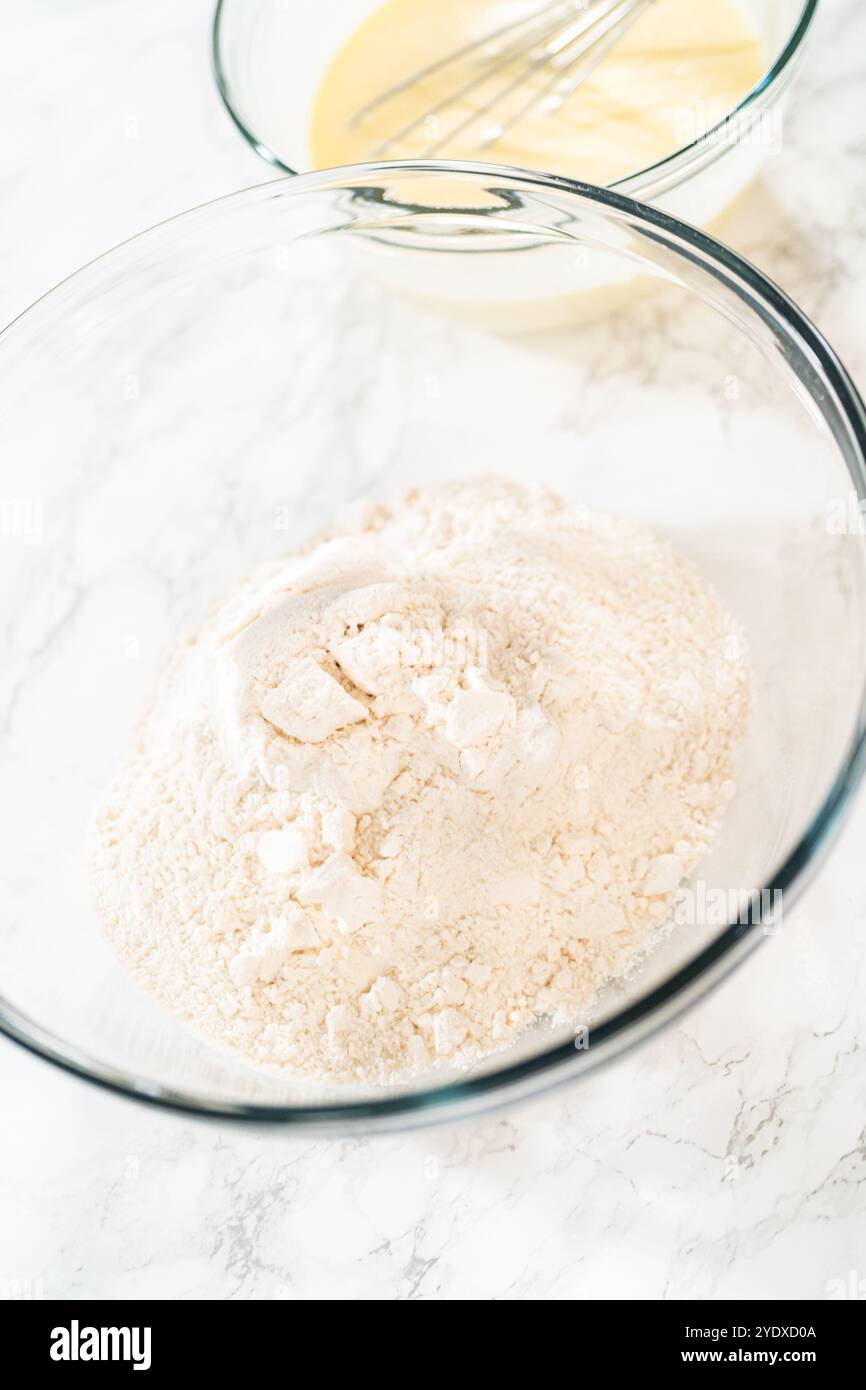 Whisking Delight - Bundt Cake Batter Preparation Begins Stock Photo - Alamy