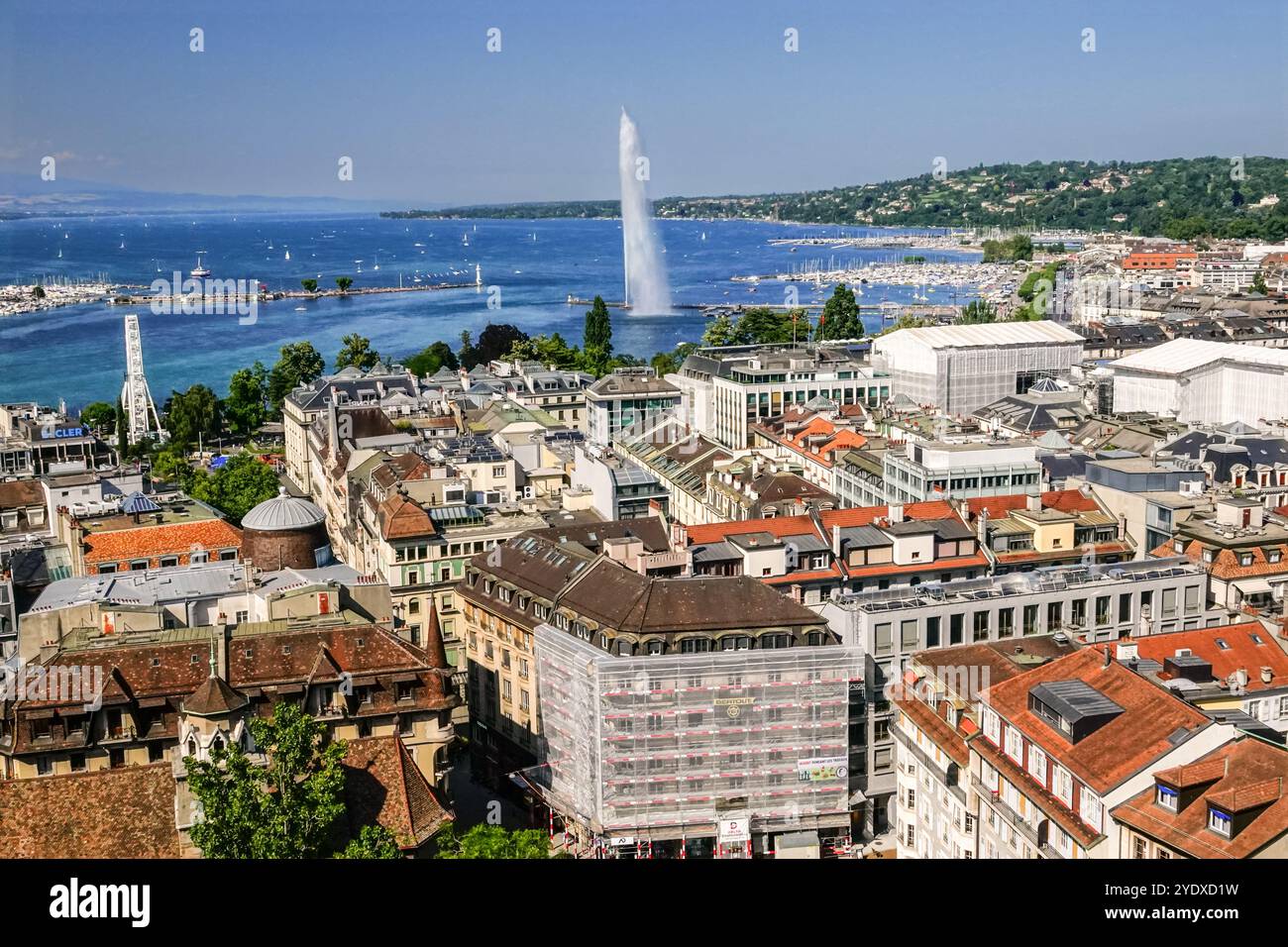 View of the Jet d’Eau or La Rade fountain and city center along Lake ...