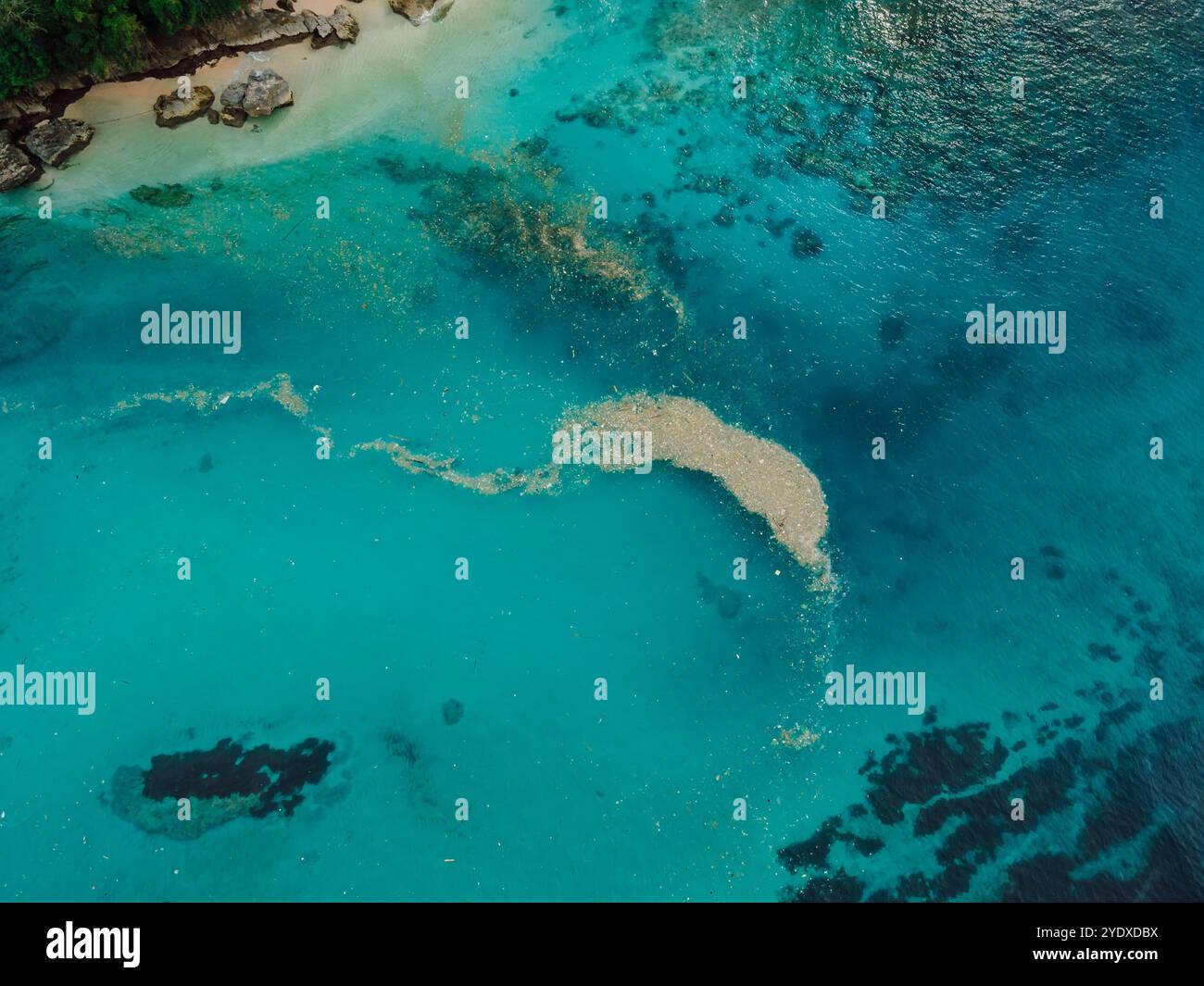 Plastic trash in ocean water. Ocean pollution, plastic in water on Bali ...