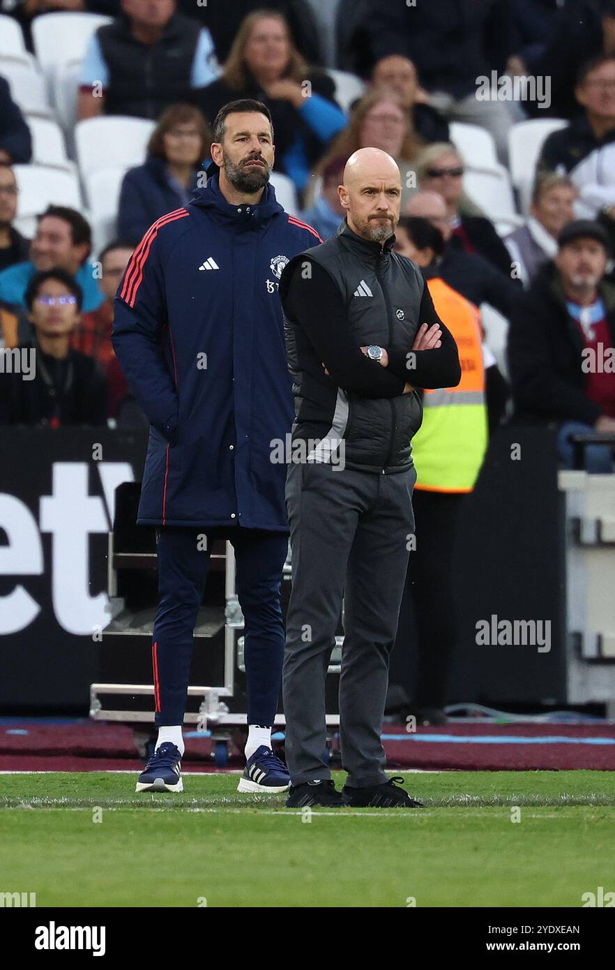Manchester United manager Erik ten Hag and Ruud van Nistelrooy look ...