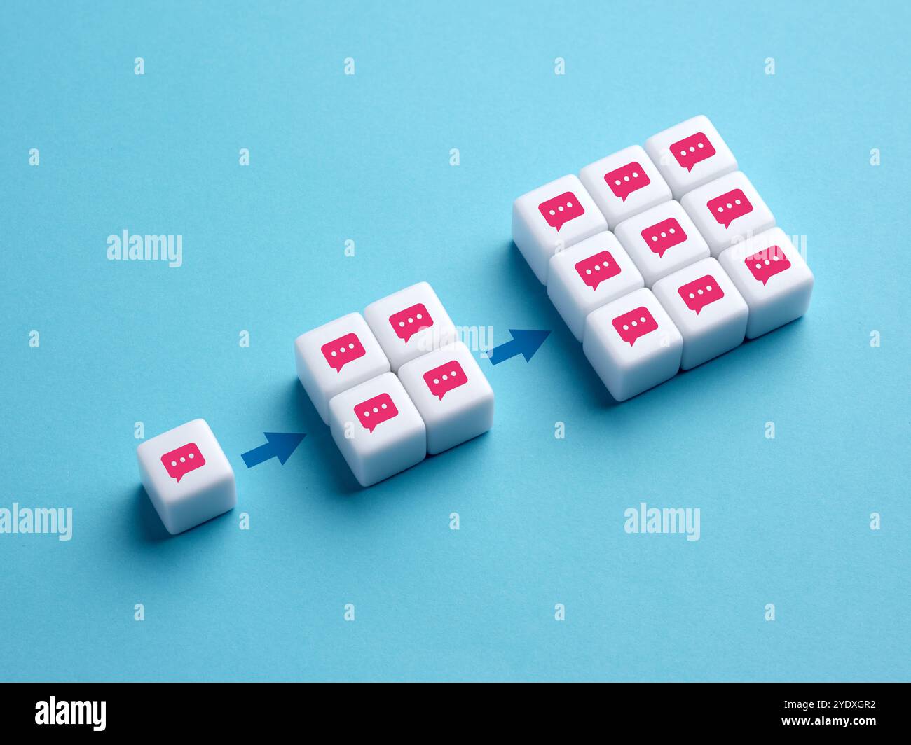 Spread the word concept. Message or thought going viral. Cubes with ...