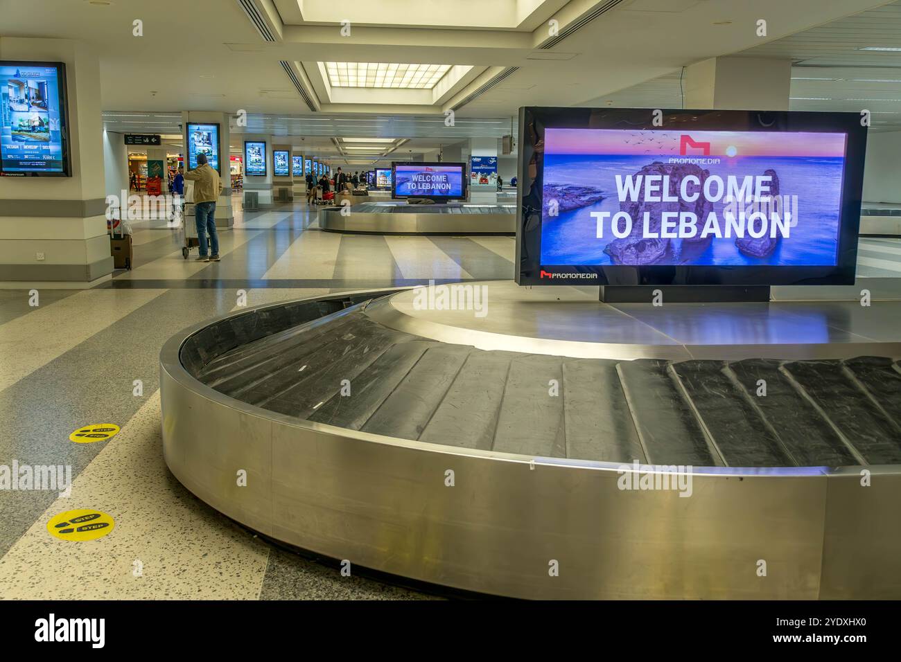 The baggage carousel with the sign "Welcome to Lebanon" in the ...