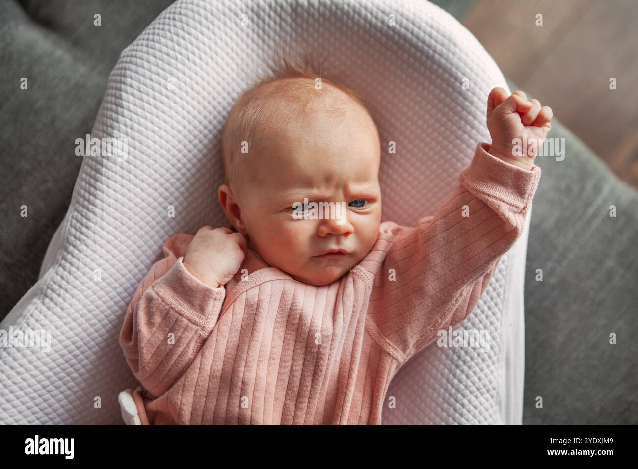 Cute Newborn Baby Girl in Pink Clothing Lying in White Cocoon, Joyfully ...