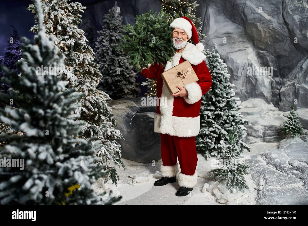 A jolly figure of Santa Claus stands amidst evergreen trees, holding a ...
