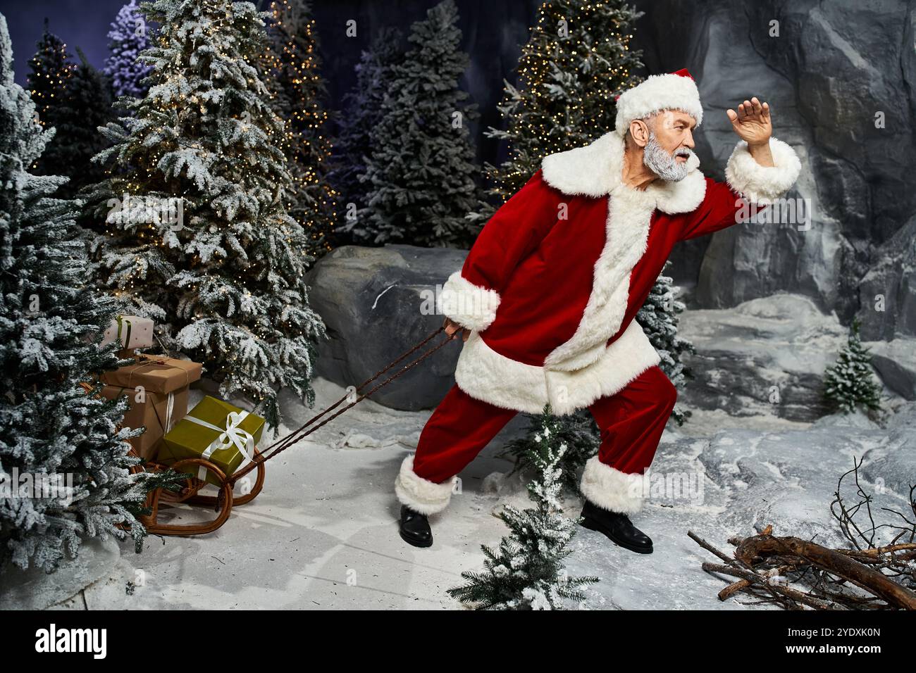 A joyful Santa Claus navigates through a snowy forest while pulling a ...