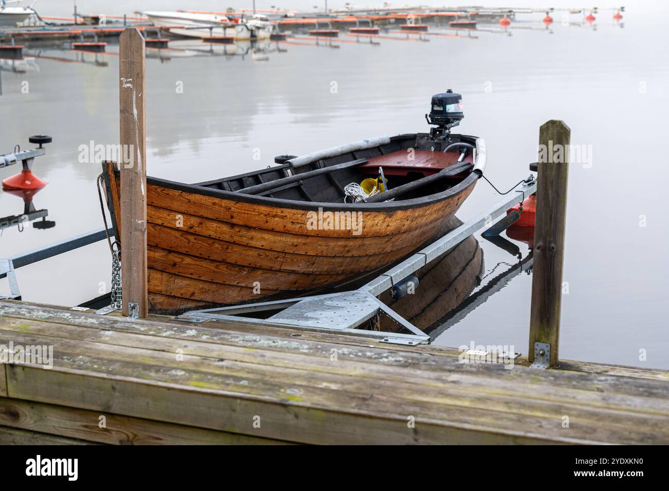 Old beautiful wooden punt with small engine Stock Photo - Alamy