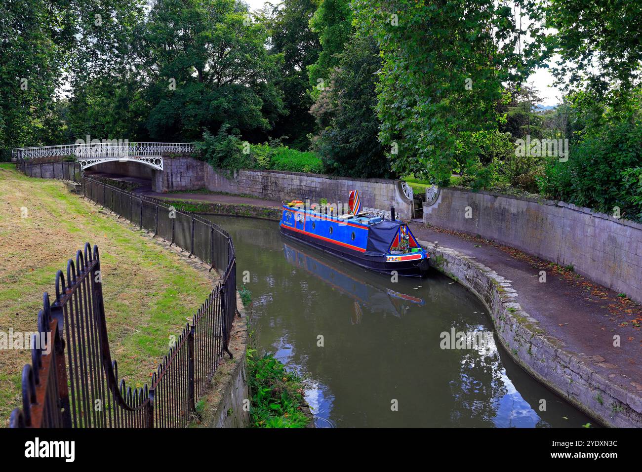 Colourful narrowboat moored on the banks of the Kennet and Avon Canal ...