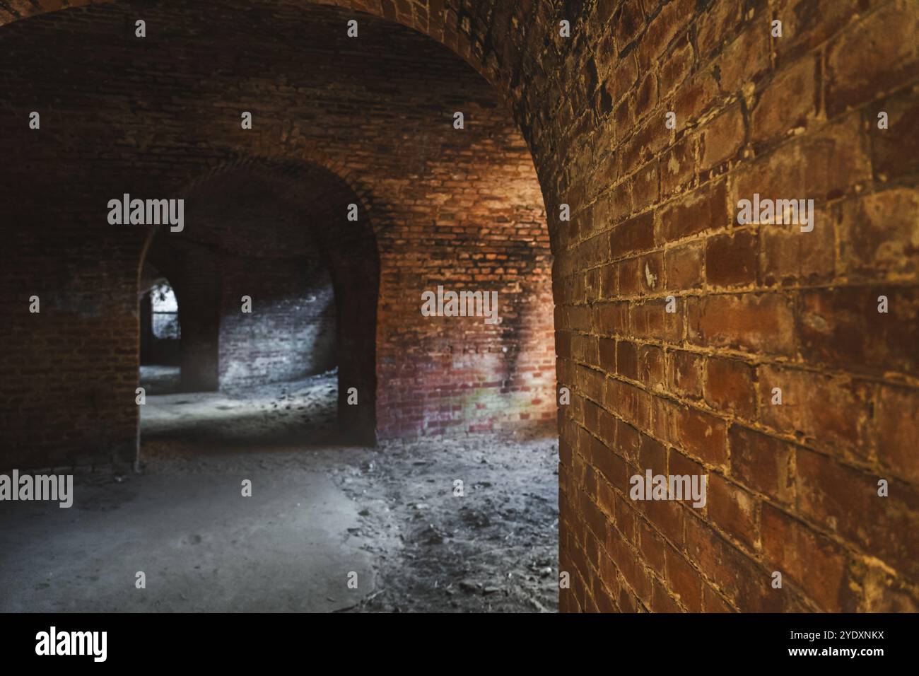 Brick walls and arches in the Bobruisk fortress. Sunlight inside the ...