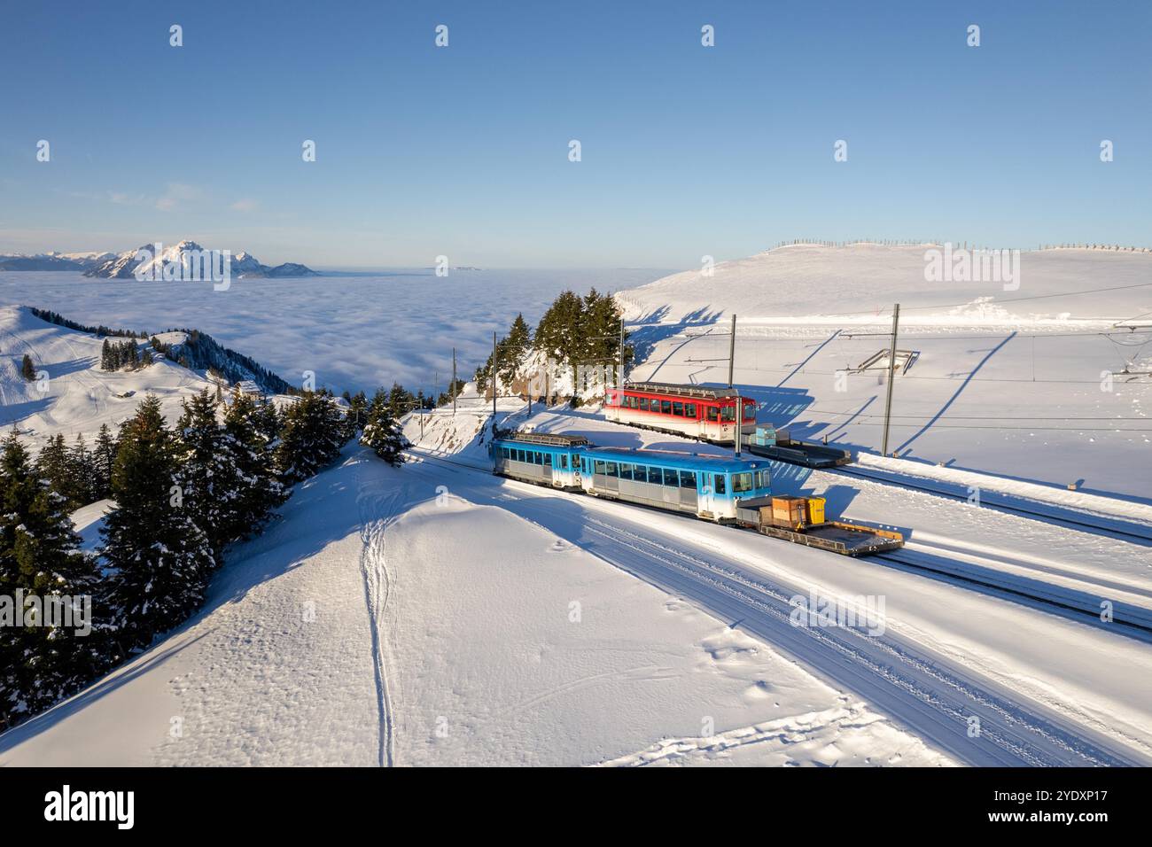 Rigibahn trains approaching the top of mount rigi Stock Photo - Alamy