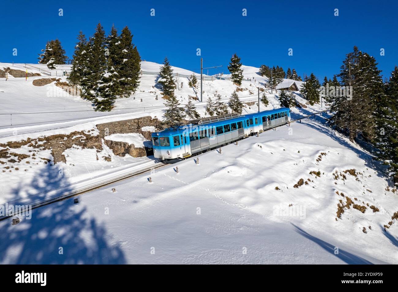 blue vitznau rigibahn train at rigi kulm Stock Photo - Alamy