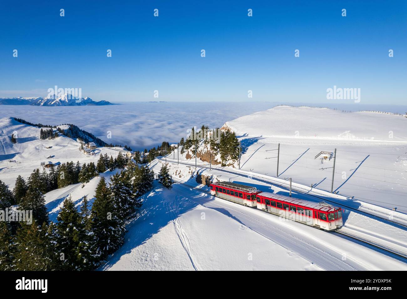 Red Vitznau Rigibahn train on mount rigi Stock Photo - Alamy