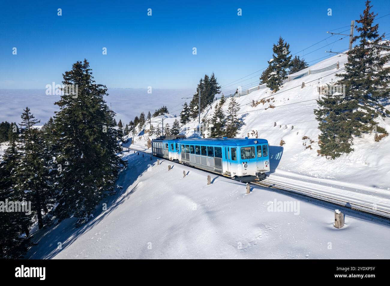 A rigibahn train is seen at the top of mount rigi during winter Stock ...
