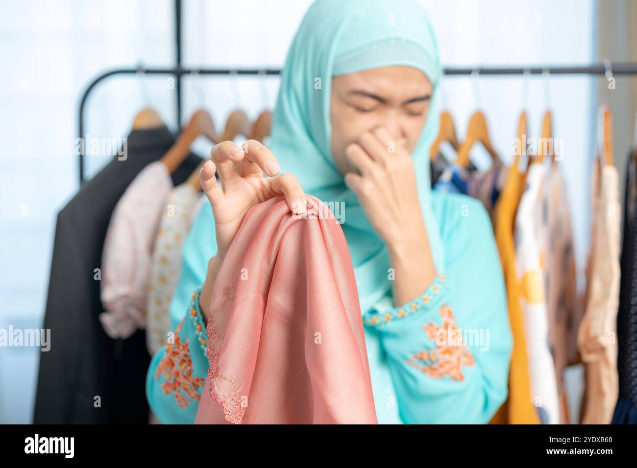 Woman laundry machine smell hi-res stock photography and images - Alamy