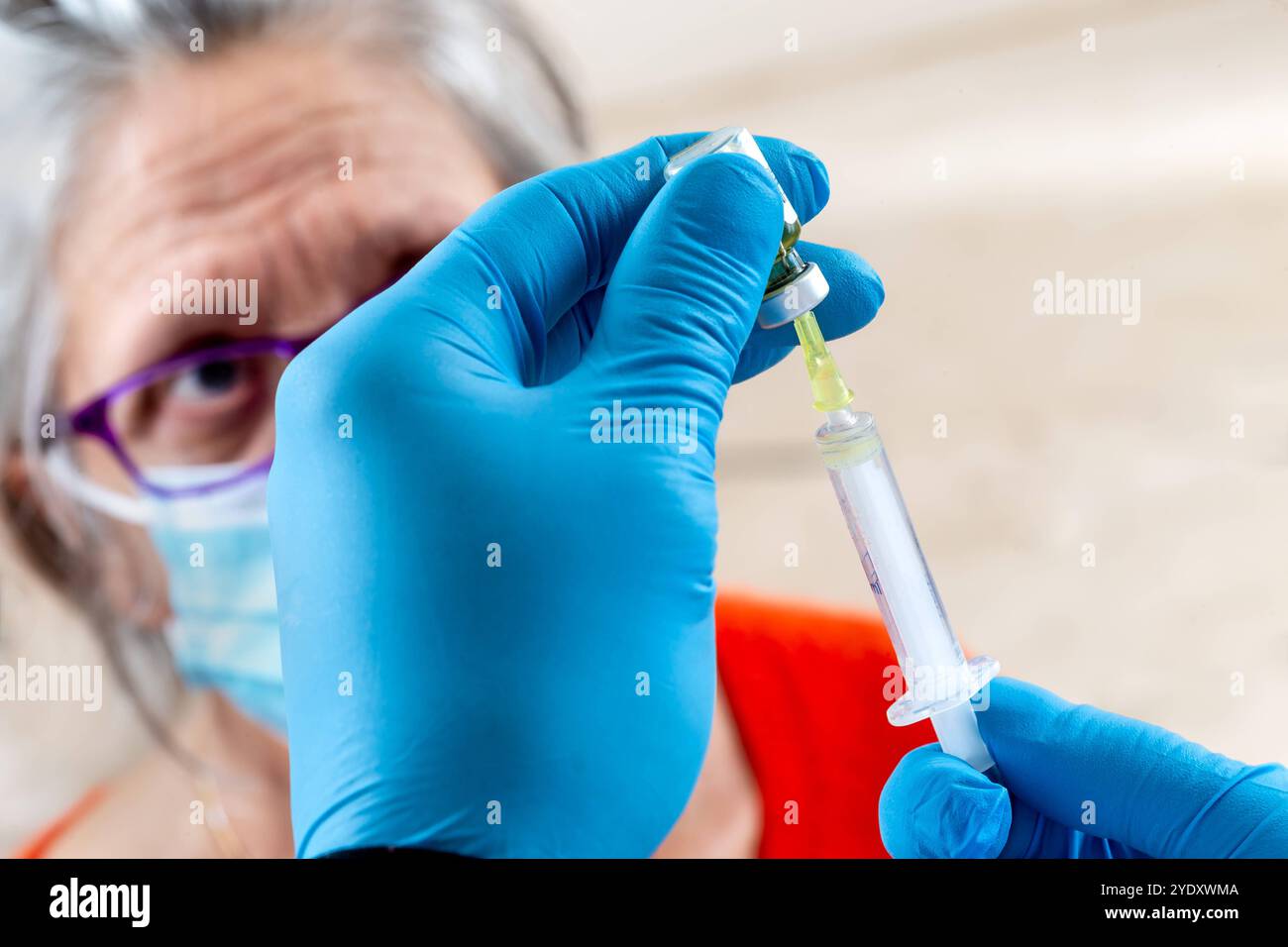 Nurse filling up syringe covid hi-res stock photography and images - Alamy