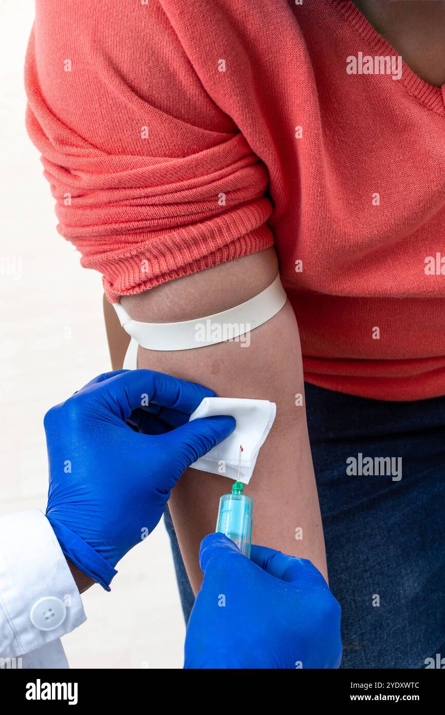 Young boy having blood drawn during pandemic. Blood test 016414 027 ...