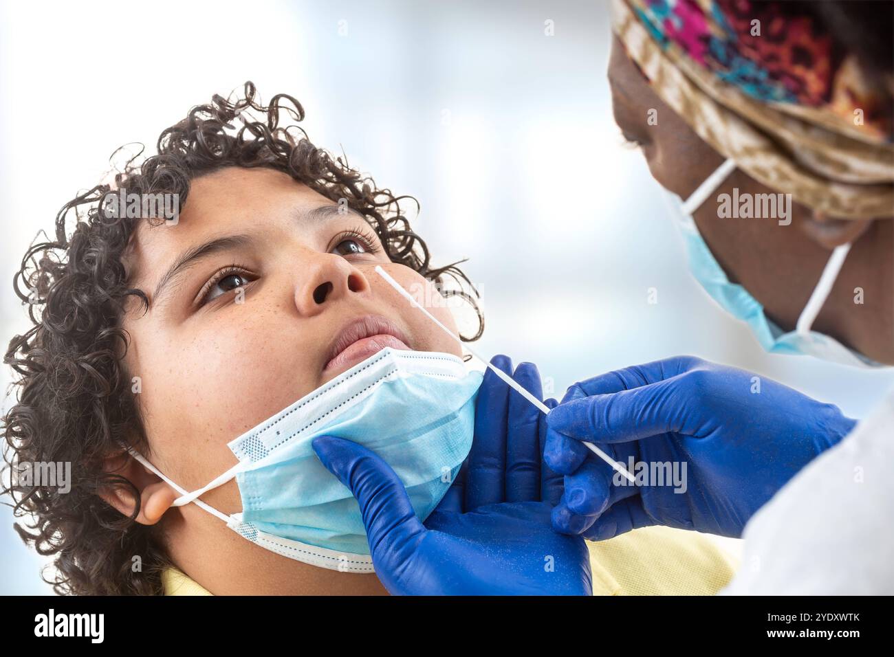 Young boy taking a nasal swab. PCR test 016414 024 Stock Photo - Alamy