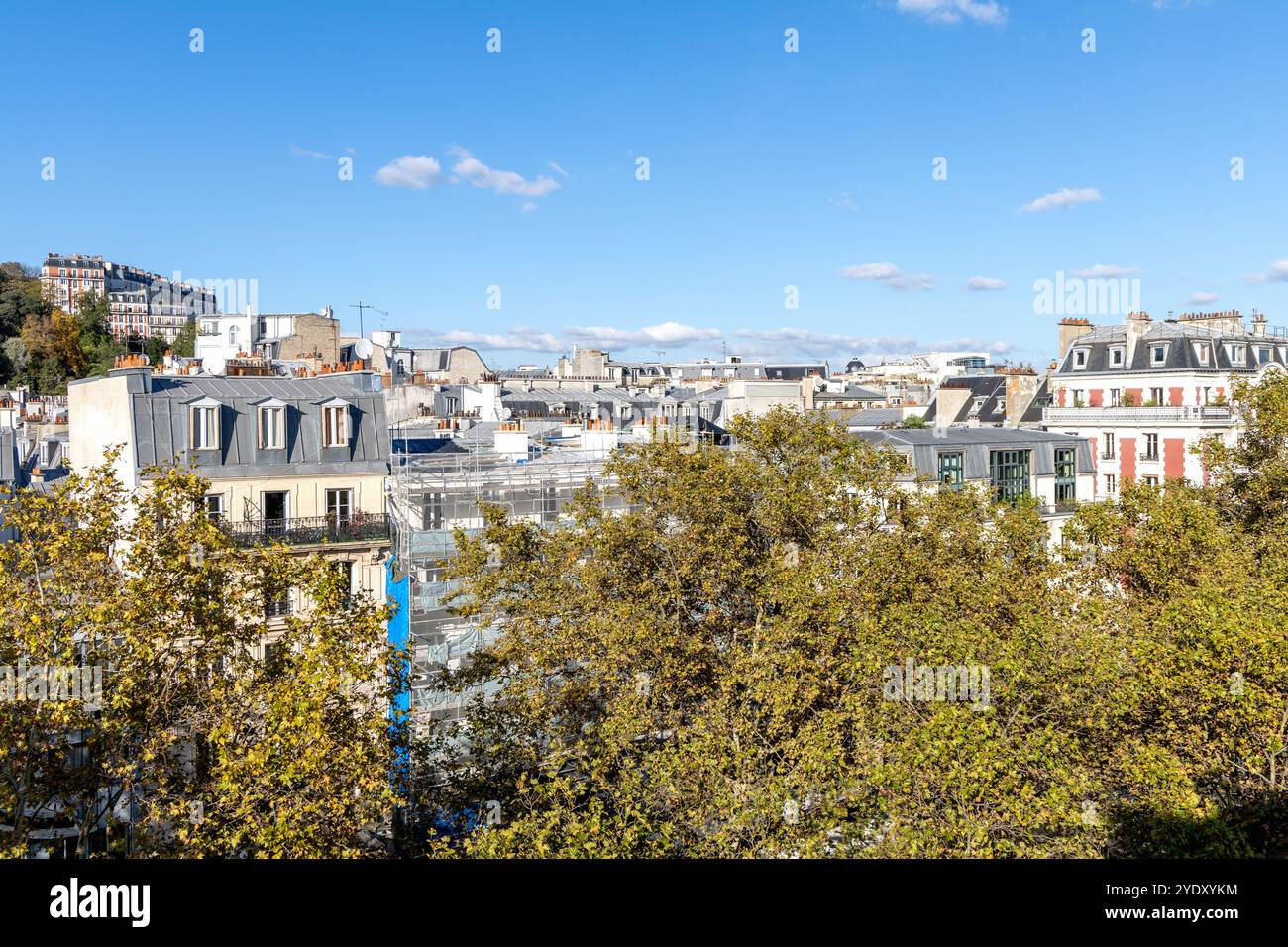 View to the streets of Montmartre and roofs of buildings in Paris ...