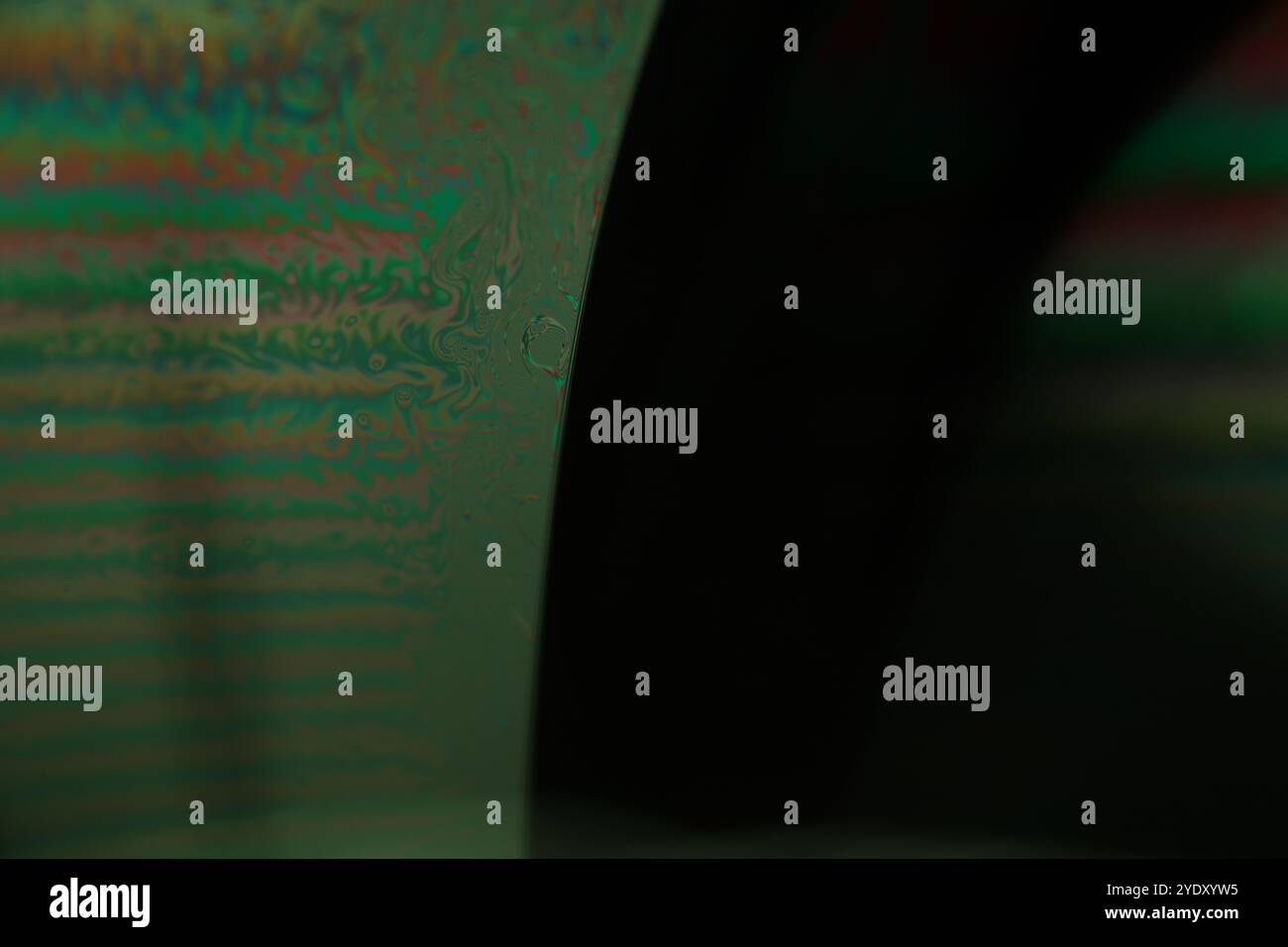 Green liquid phenomenal structure , green oils on a dark background ...