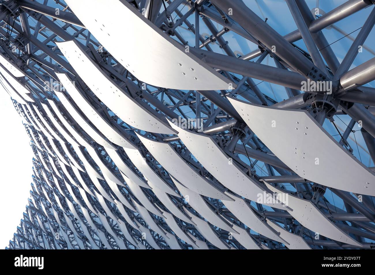 A striking architectural structure showcases a curved facade made of ...