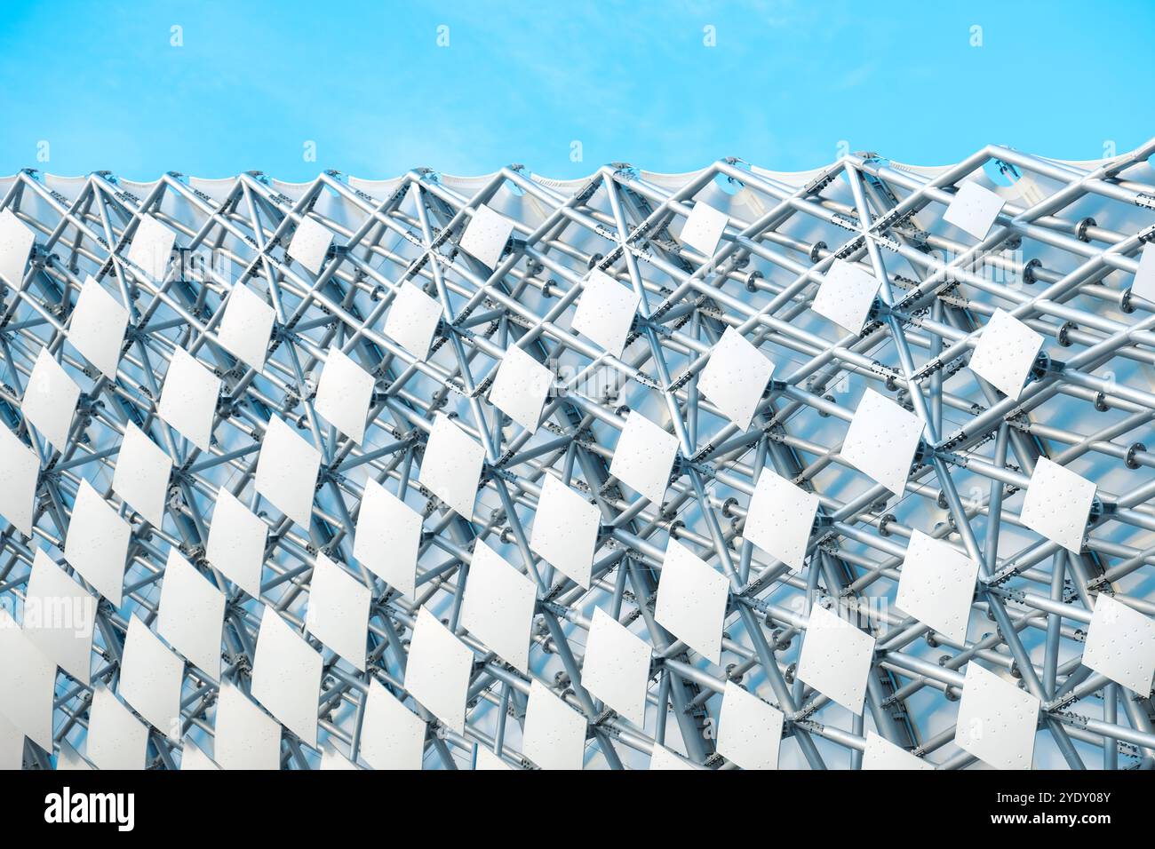 A unique lattice structure with geometric patterns stands prominently ...