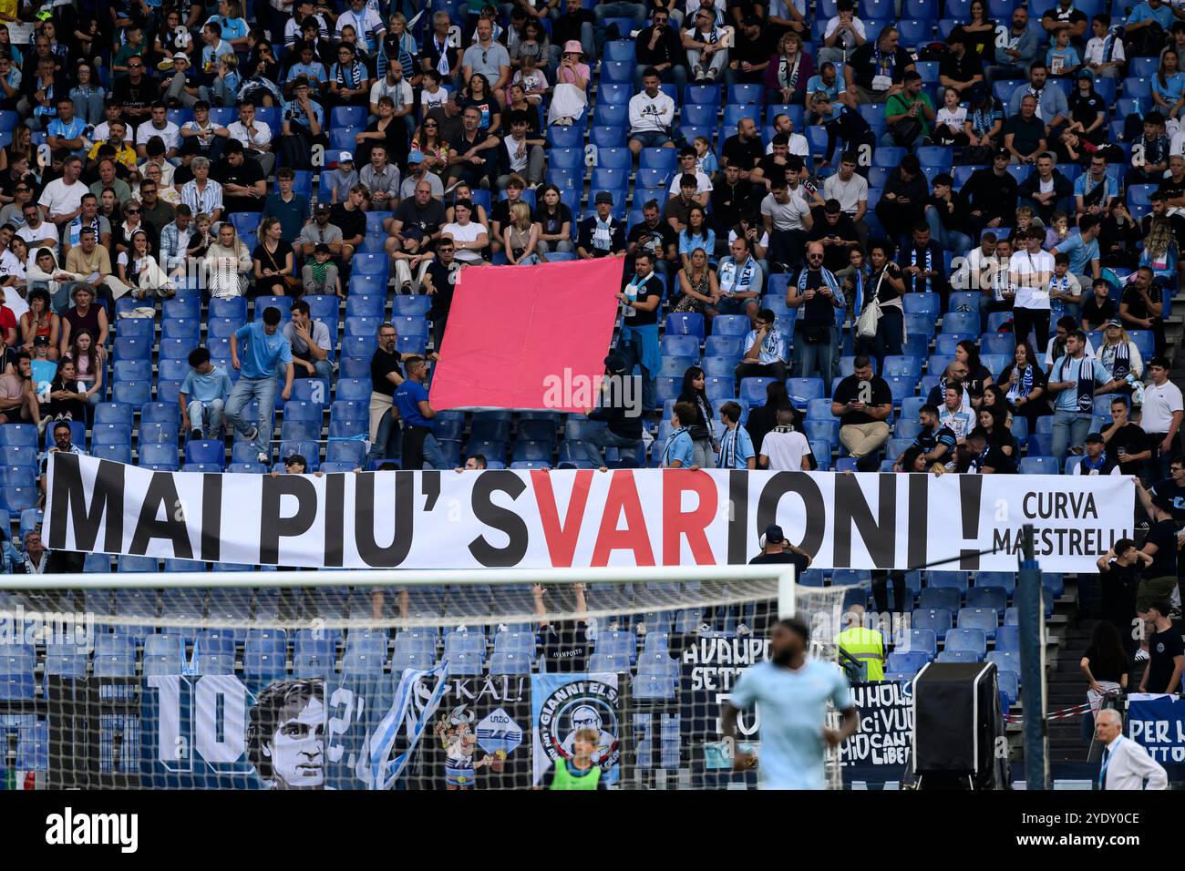 SS Lazio fans show a big red card and a banner about refereeing and VAR ...