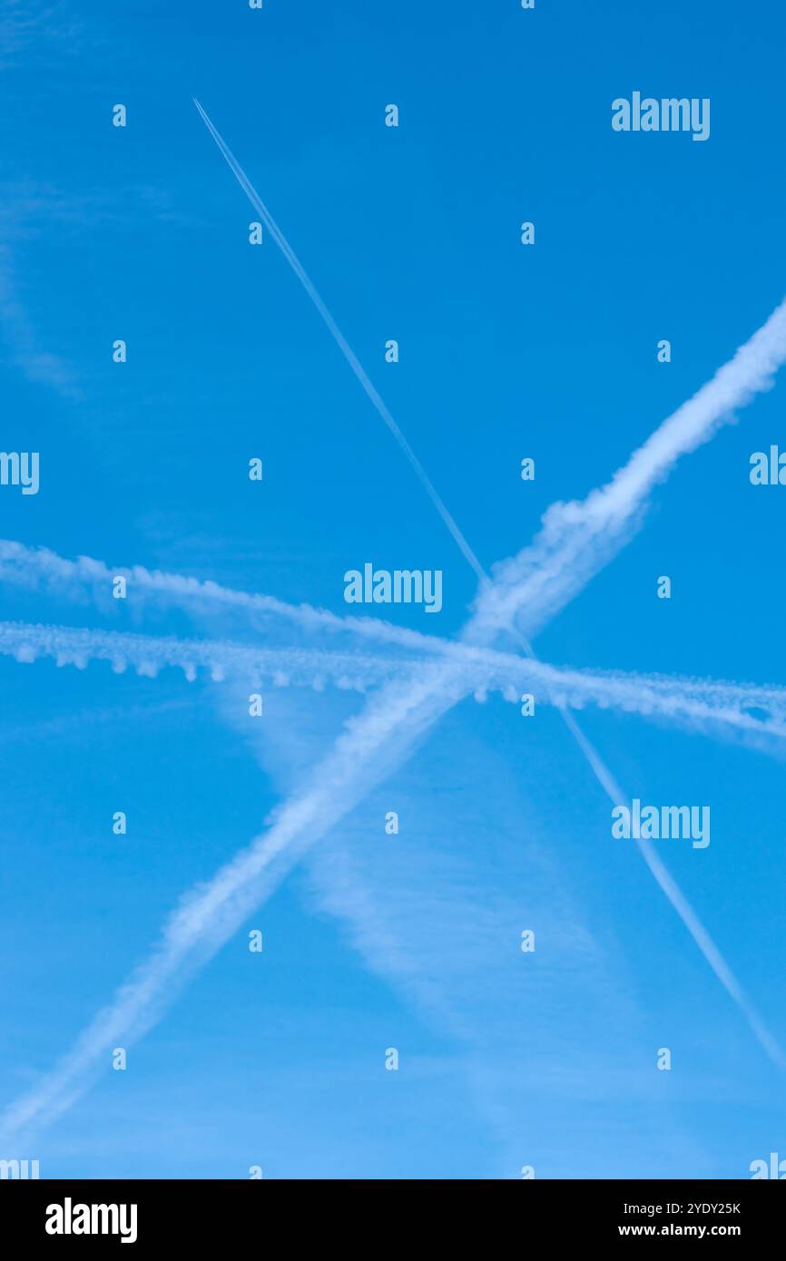 Portrait format aircraft trails in sky hi-res stock photography and ...