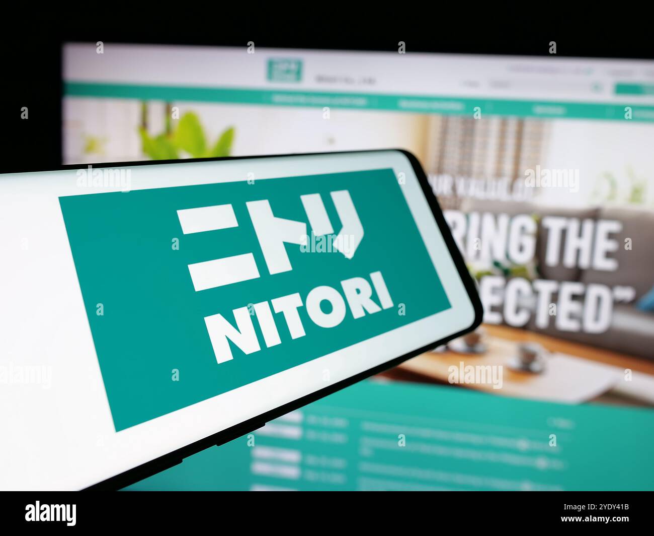 Mobile phone with logo of Japanese retail company Nitori Co. Ltd. on ...